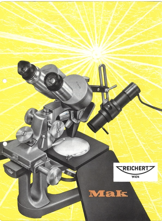 A microscope on a yellow backgroundDescription automatically generated
