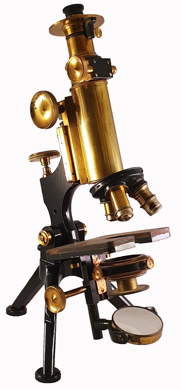 A close-up of a microscopeDescription automatically generated