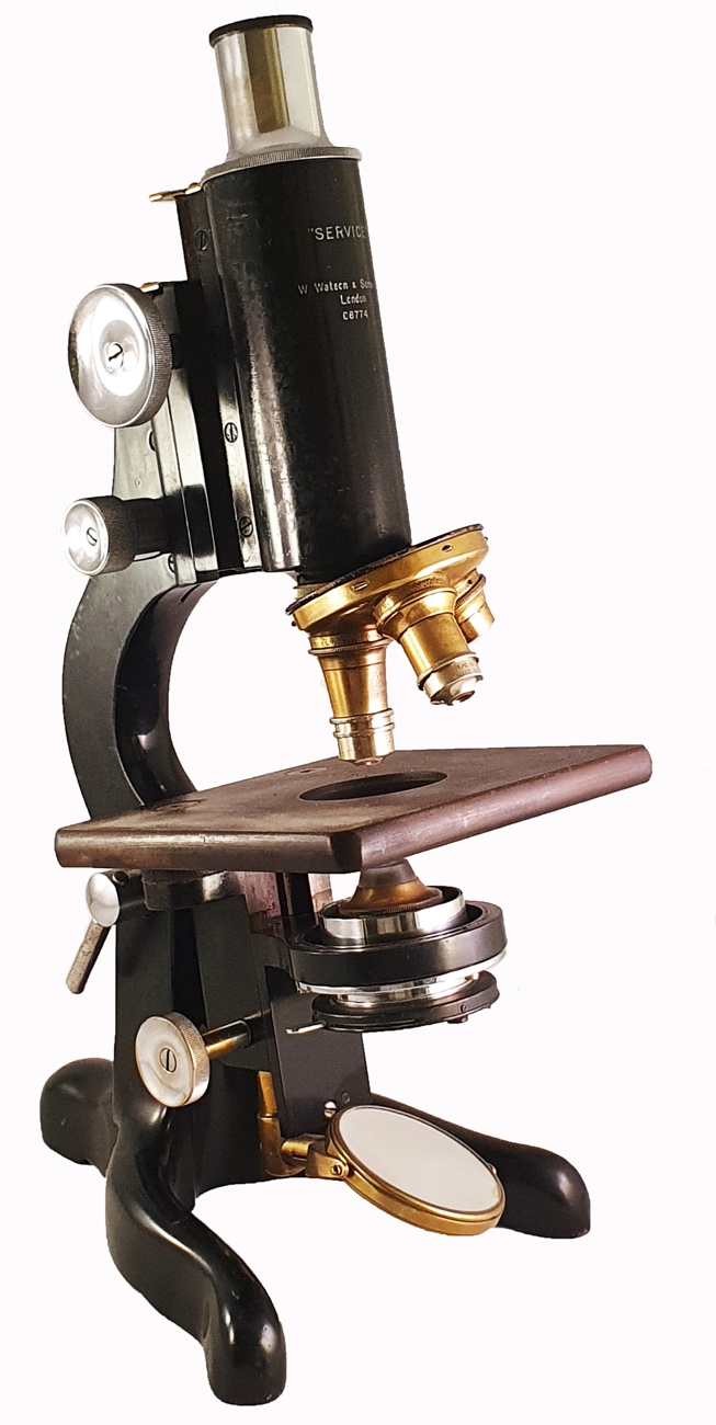 A close-up of a microscopeDescription automatically generated