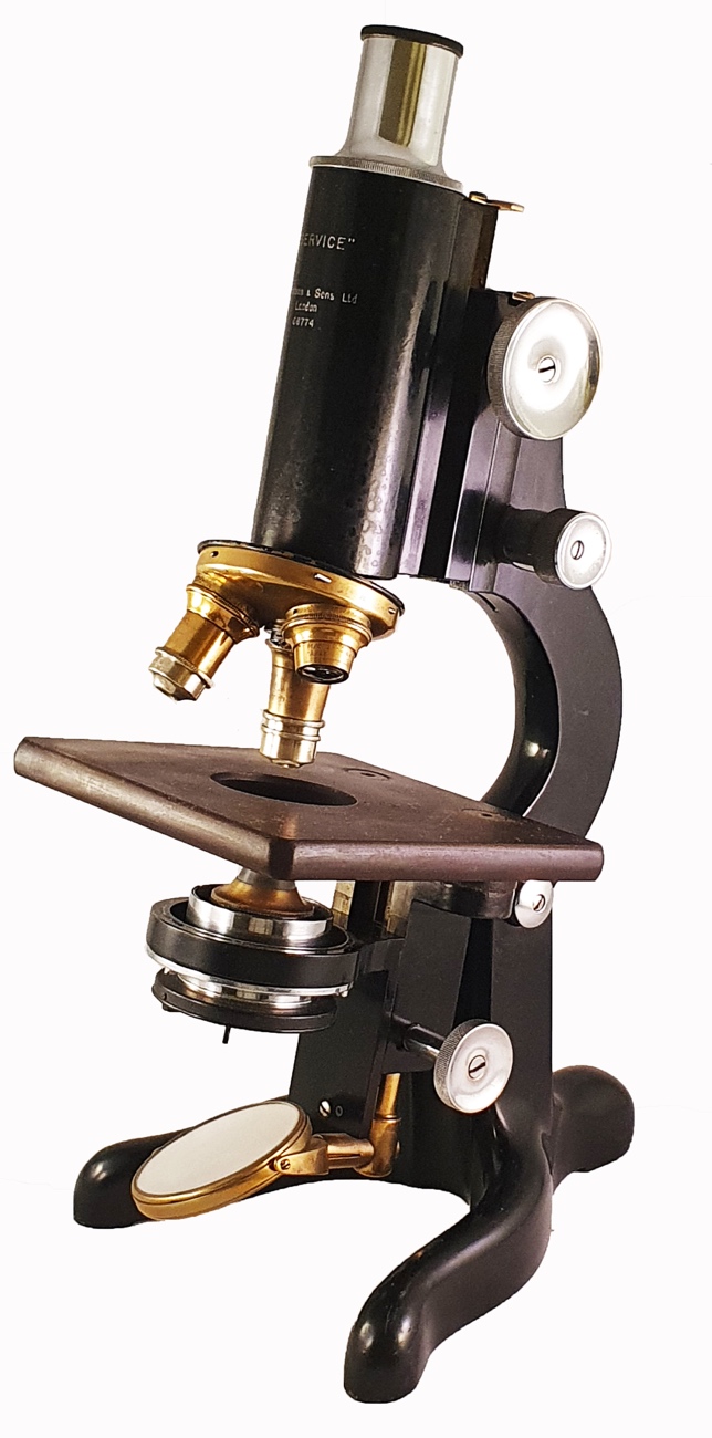 A close-up of a microscopeDescription automatically generated