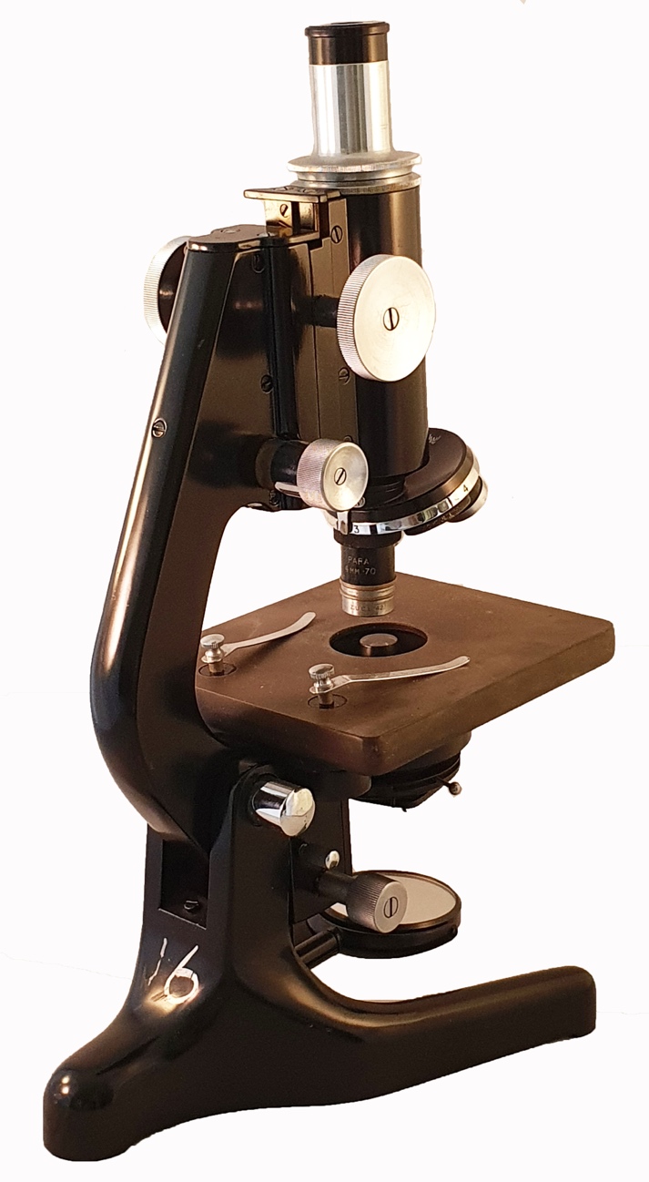 A close-up of a microscopeDescription automatically generated