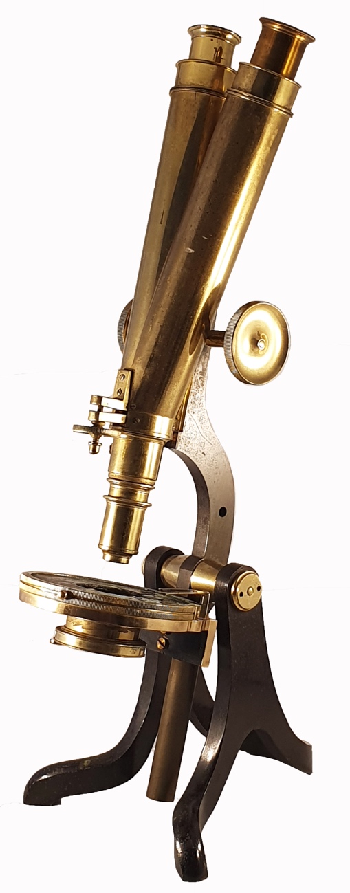 A close-up of a microscopeDescription automatically generated